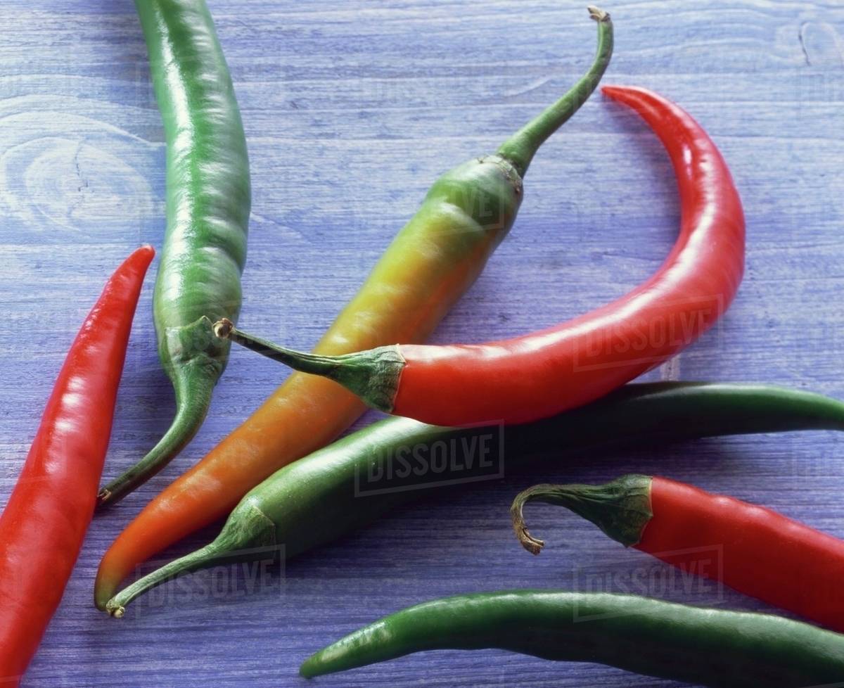 Different coloured chillies - Royalty-free Stock Photo | Dissolve