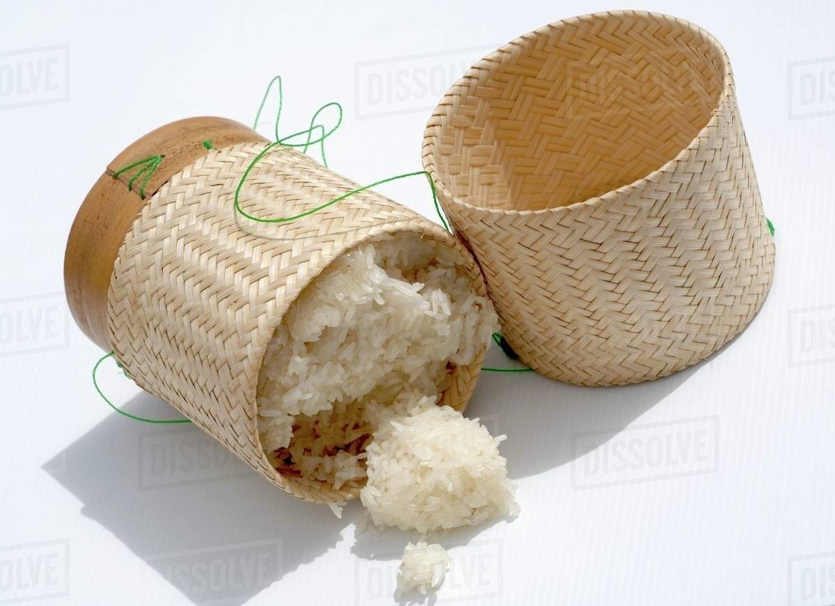Bamboo basket of sticky rice, fallen over - Royalty-free Stock Photo ...