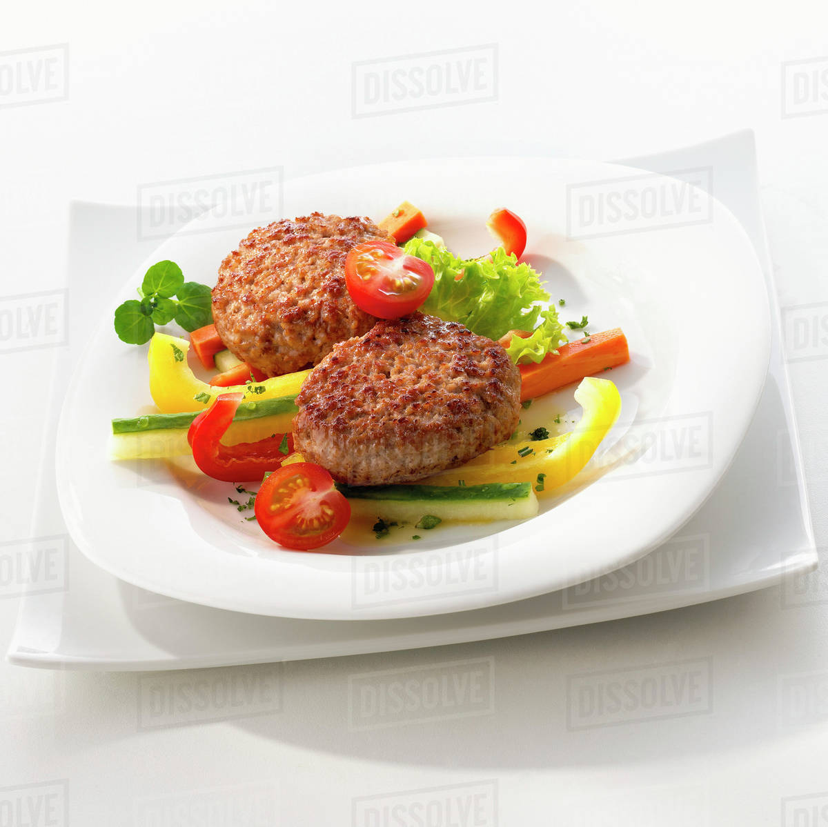 Rissoles with mixed vegetables - Stock Photo - Dissolve