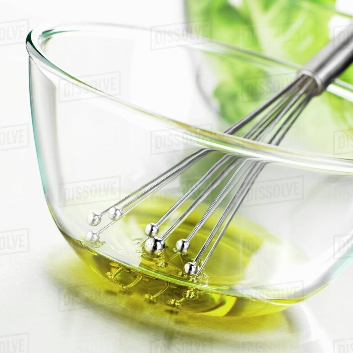 Mixing salad dressing - Royalty-free Stock Photo | Dissolve