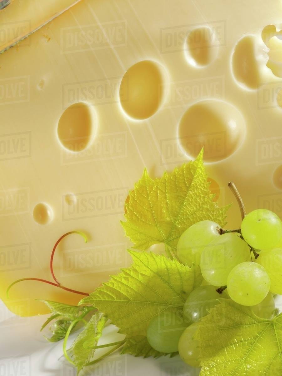 Leerdammer cheese with grapes - Royalty-free Stock Photo | Dissolve