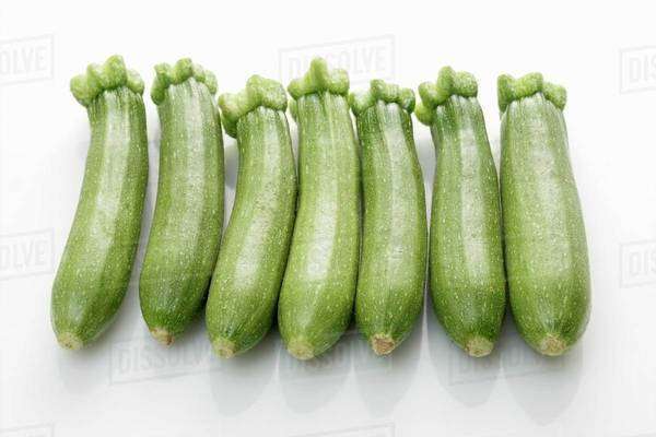 Baby courgettes - Royalty-free Stock Photo | Dissolve
