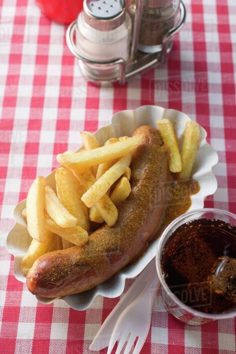 Currywurst (sausage with ketchup & curry powder) with chips & cola ...