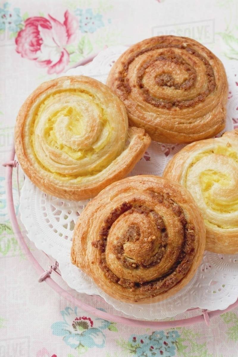 Danish pastry snails with nut and custard fillings - Royalty-free Stock ...