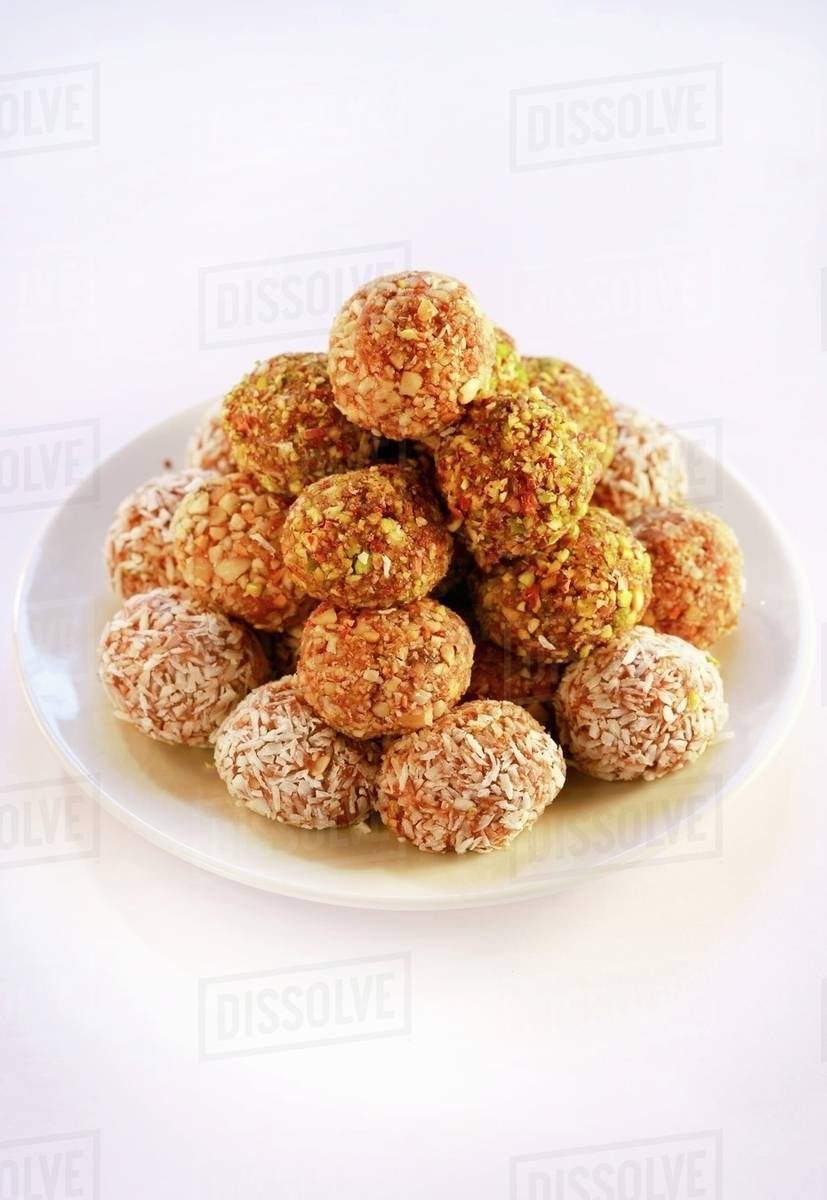 Chocolate truffles on a plate - Stock Photo - Dissolve