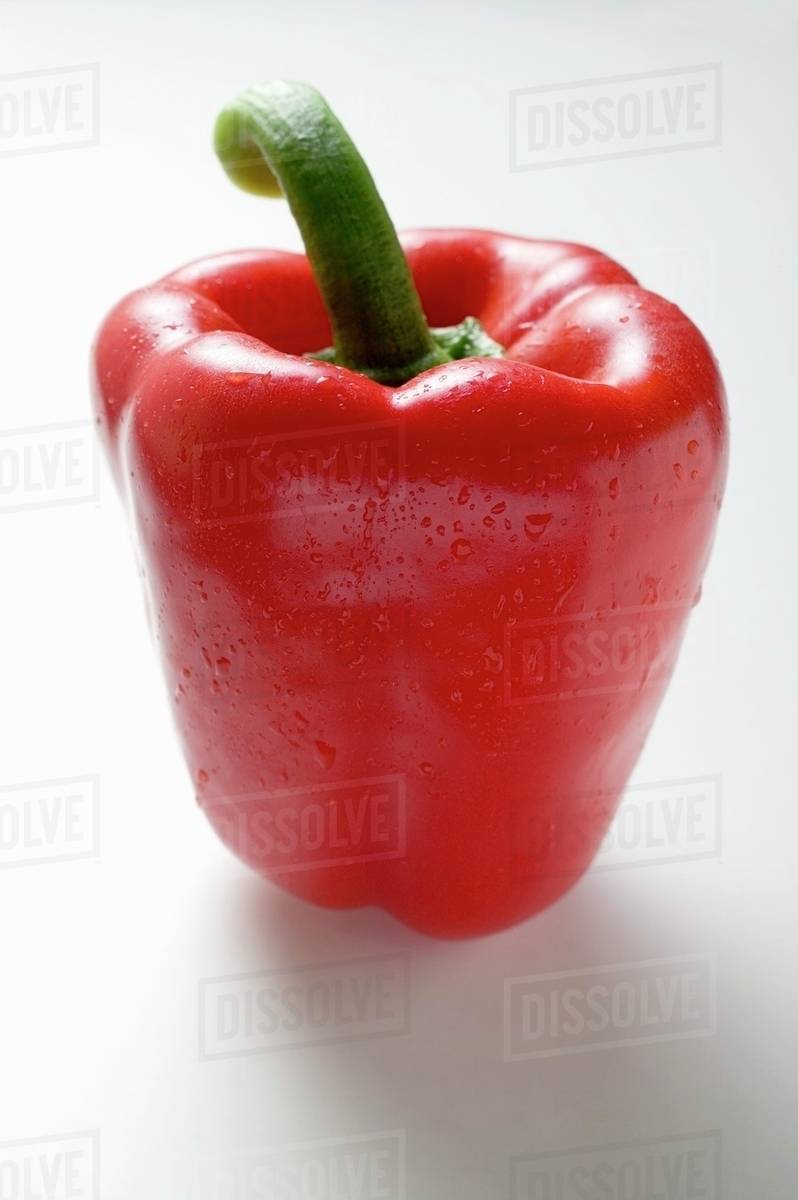Red pepper with drops of water - Royalty-free Stock Photo | Dissolve