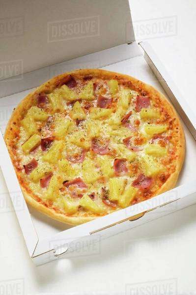 Hawaiian pizza with ham and pineapple in pizza box - Royalty-free Stock ...