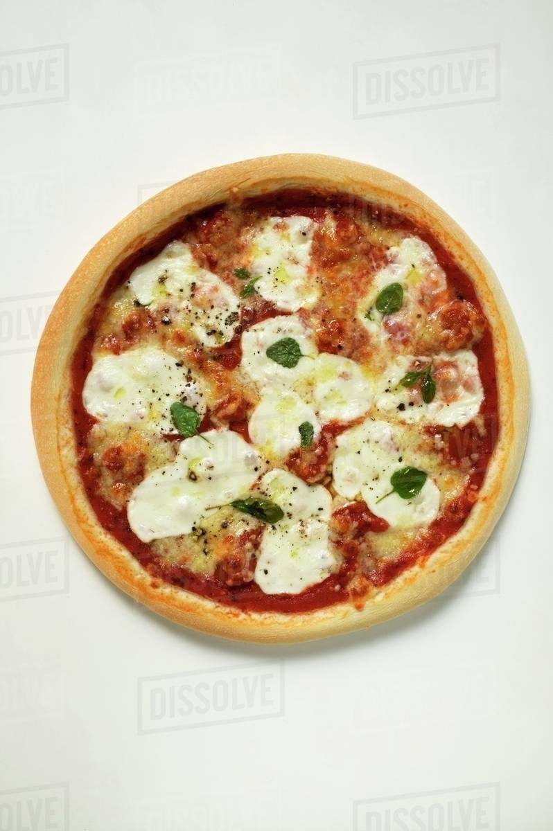 Mozzarella pizza - Royalty-free Stock Photo | Dissolve