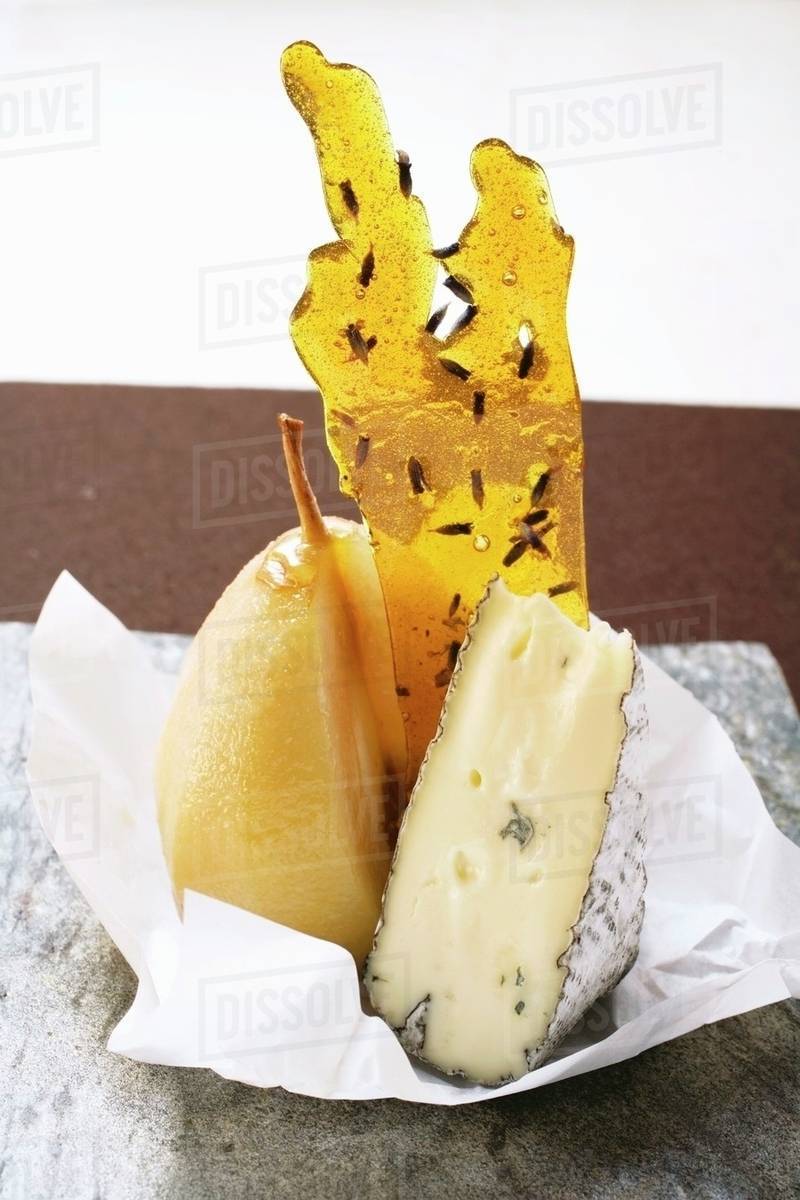 Rochebaron with pear and praline on paper - Royalty-free Stock Photo ...