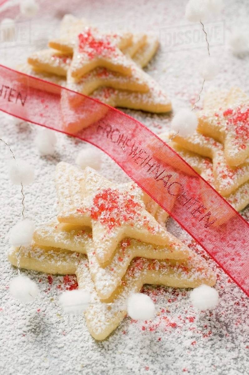 Pastry stars with sugar (for Christmas) - Stock Photo - Dissolve