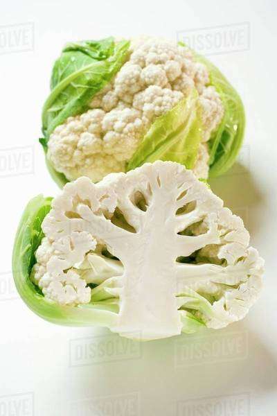 Whole and half cauliflower - Stock Photo - Dissolve