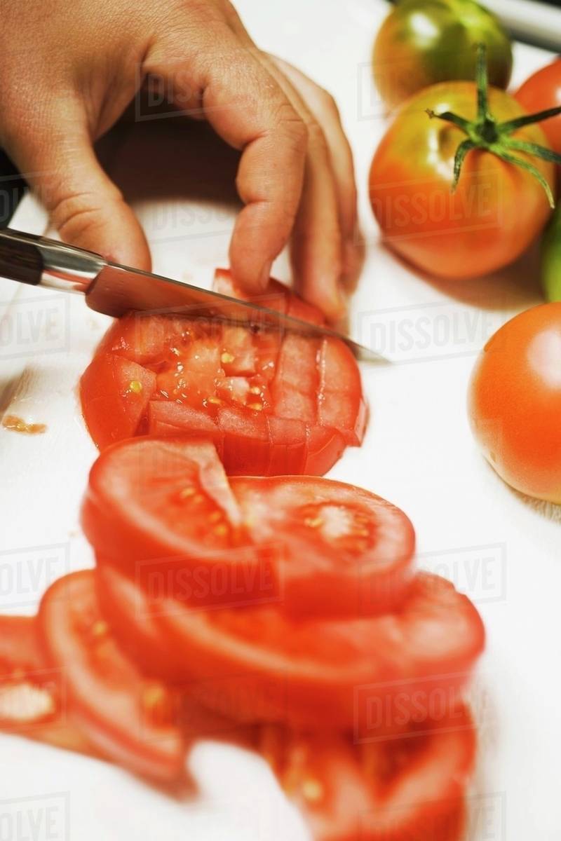 Dicing tomato - Royalty-free Stock Photo | Dissolve
