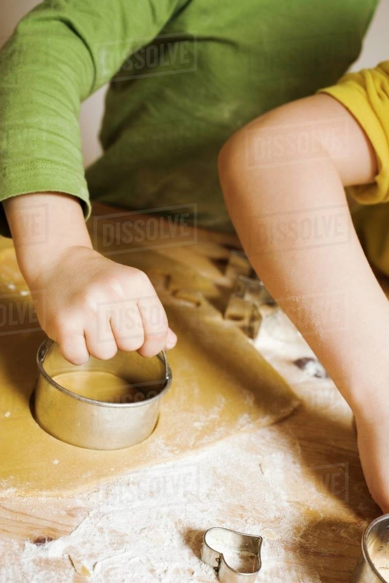 Children cutting out biscuits - Royalty-free Stock Photo | Dissolve