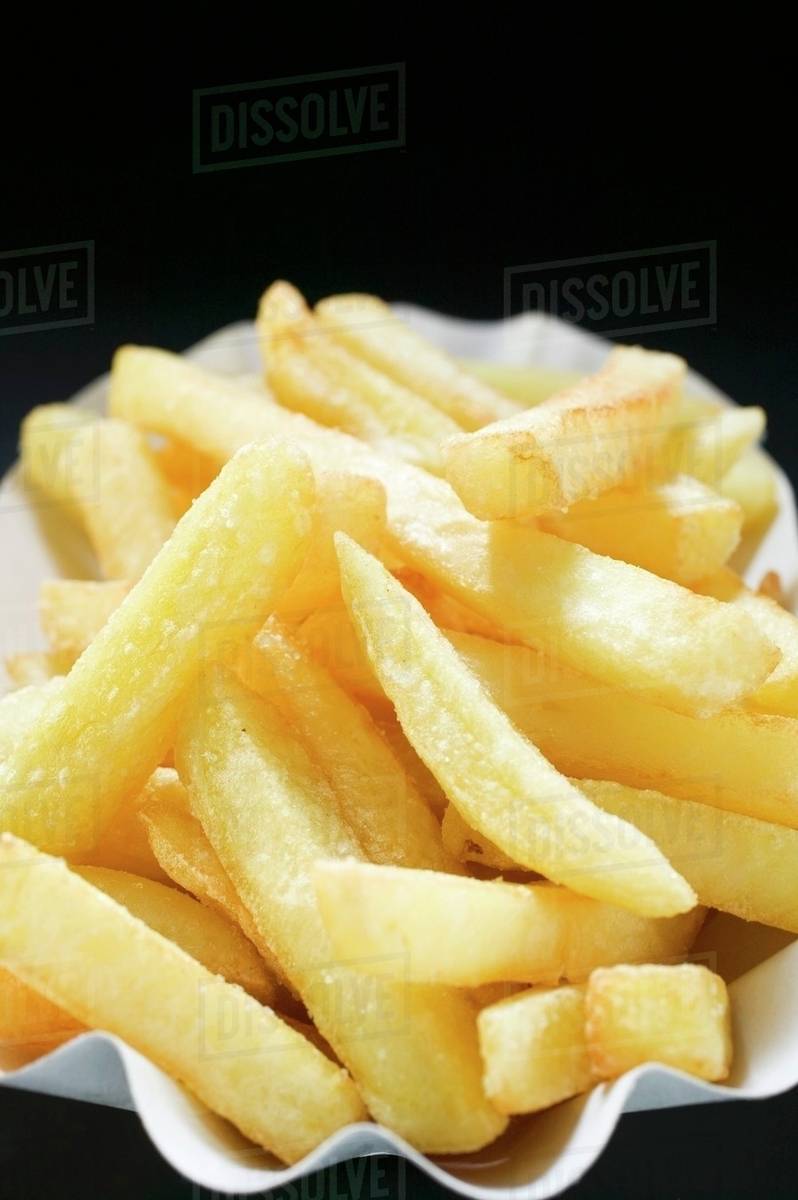 Chips in paper dish - Stock Photo - Dissolve