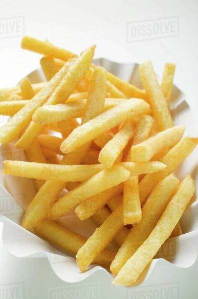 Chips in paper dish - Royalty-free Stock Photo | Dissolve