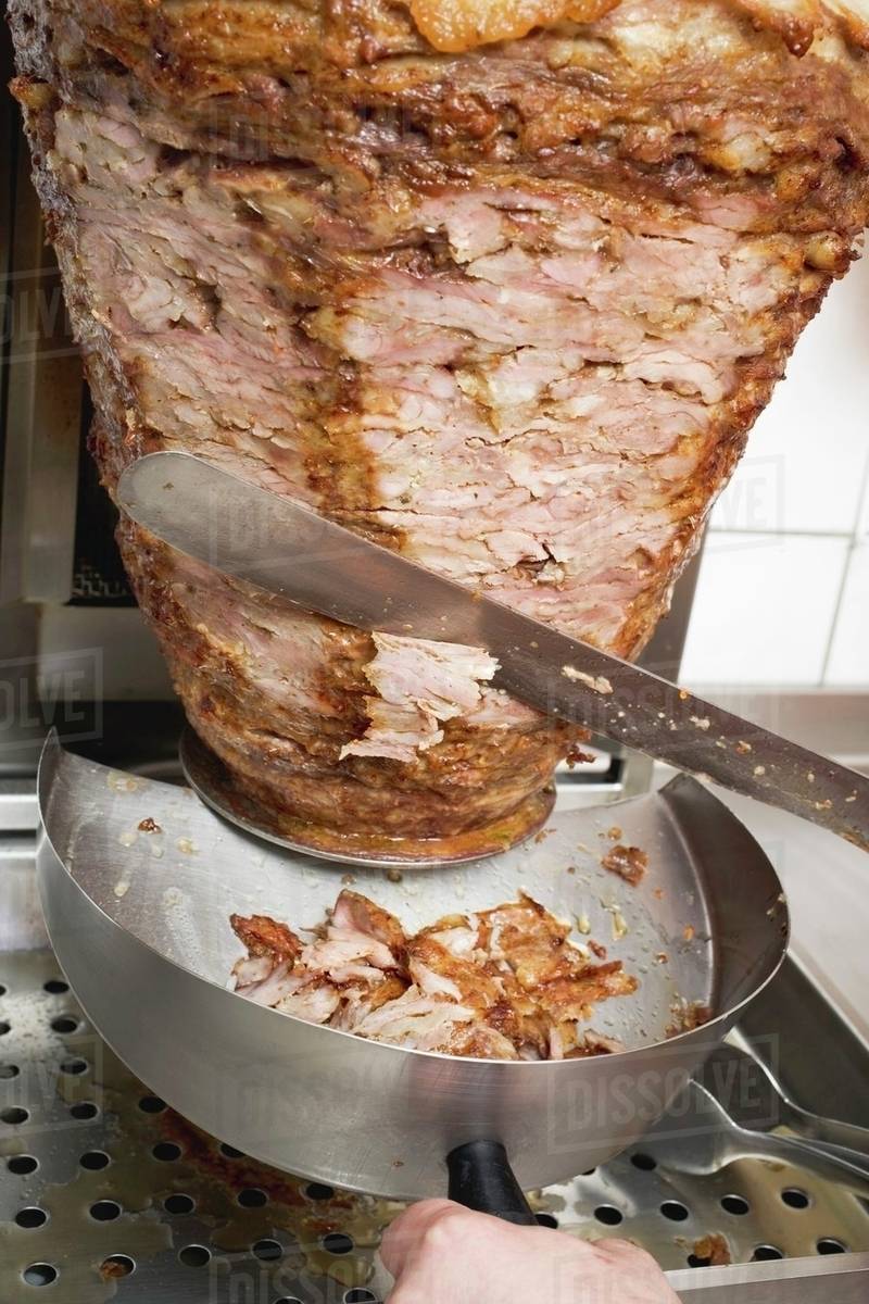 Slicing doner kebab - Royalty-free Stock Photo | Dissolve