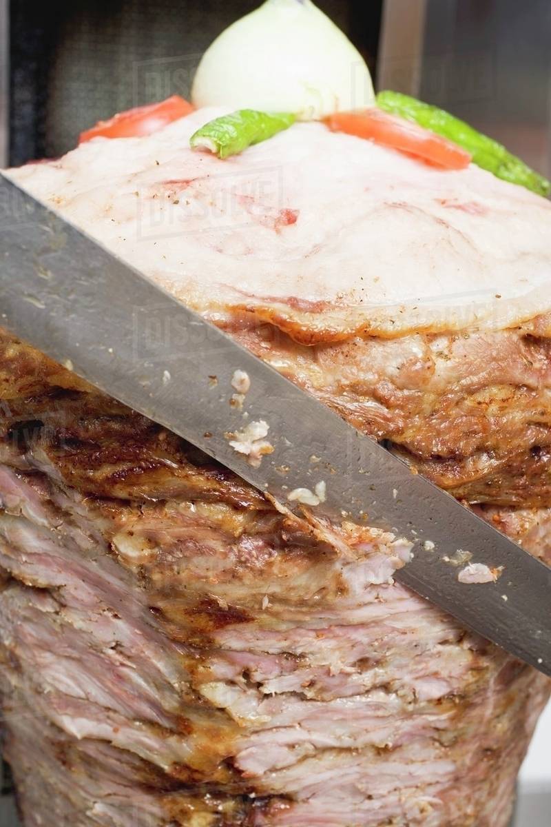Slicing a doner kebab (close-up) - Royalty-free Stock Photo | Dissolve