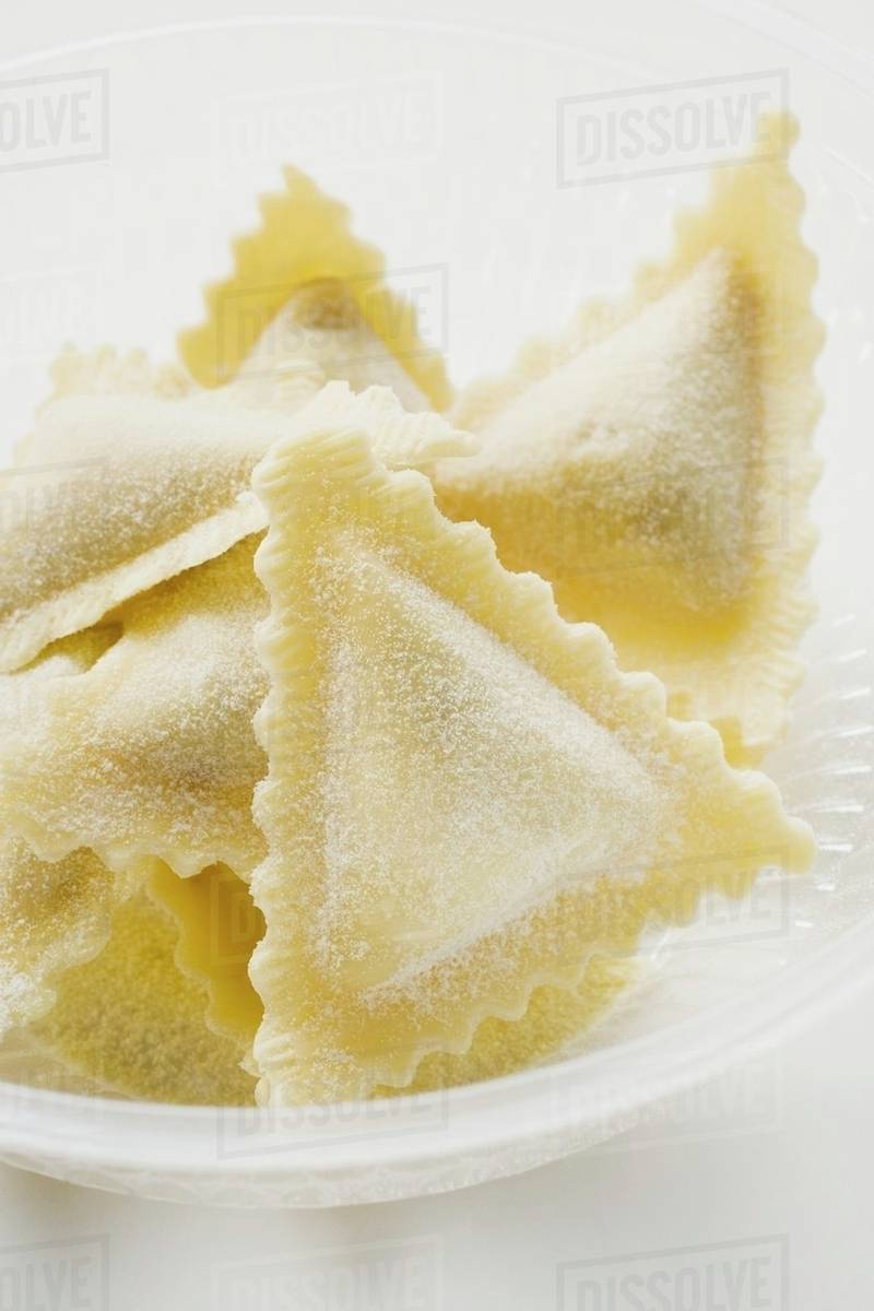 Home-made triangular ravioli - Royalty-free Stock Photo | Dissolve