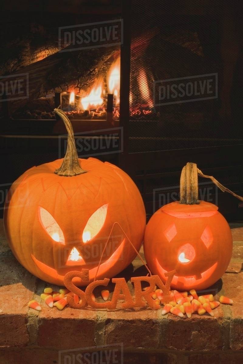 Pumpkin lanterns, the word 'Scary' & candy corn for Halloween - Royalty ...