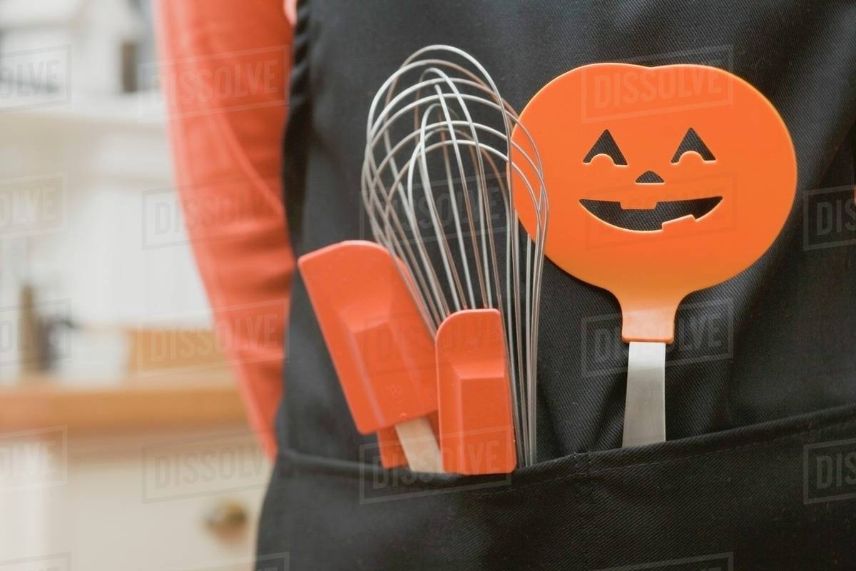 Kitchen tools for Halloween in an apron pocket - Royalty-free Stock ...