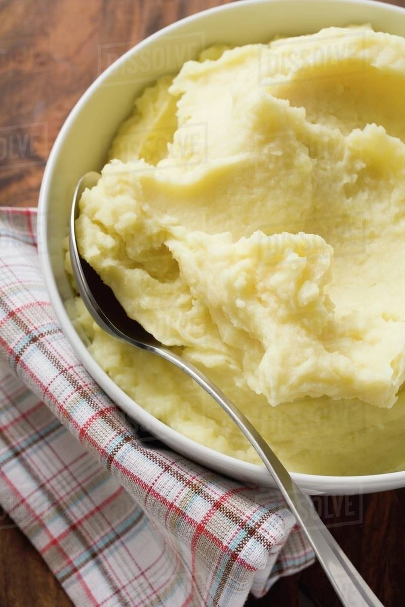 Mashed potato in white bowl with spoon - Royalty-free Stock Photo ...