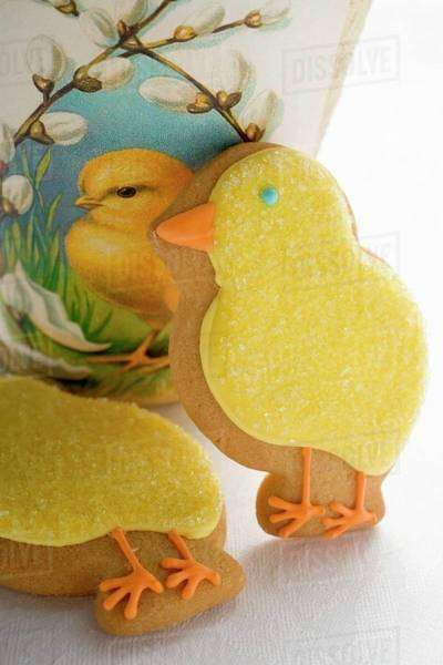 Two Easter biscuits (yellow chicks) - Stock Photo - Dissolve