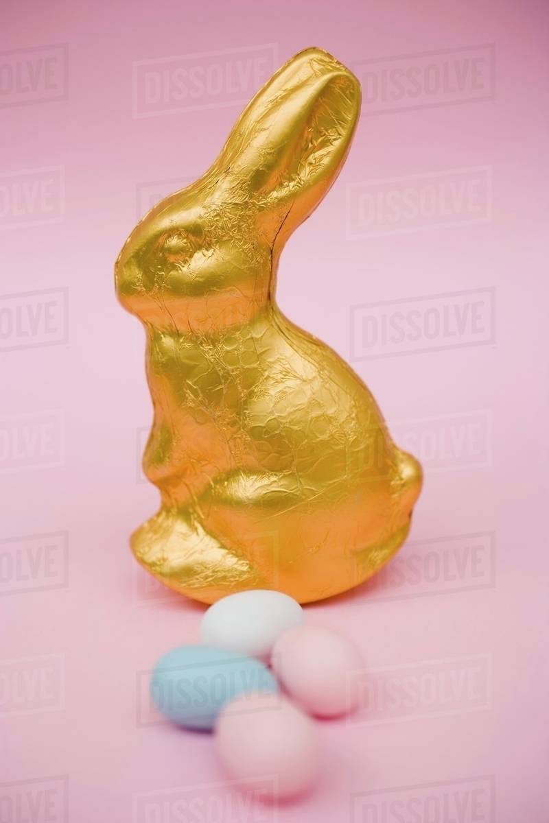 Gold Easter Bunny and sugar eggs - Royalty-free Stock Photo | Dissolve