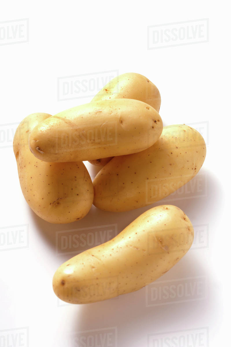 Five potatoes - Royalty-free Stock Photo | Dissolve