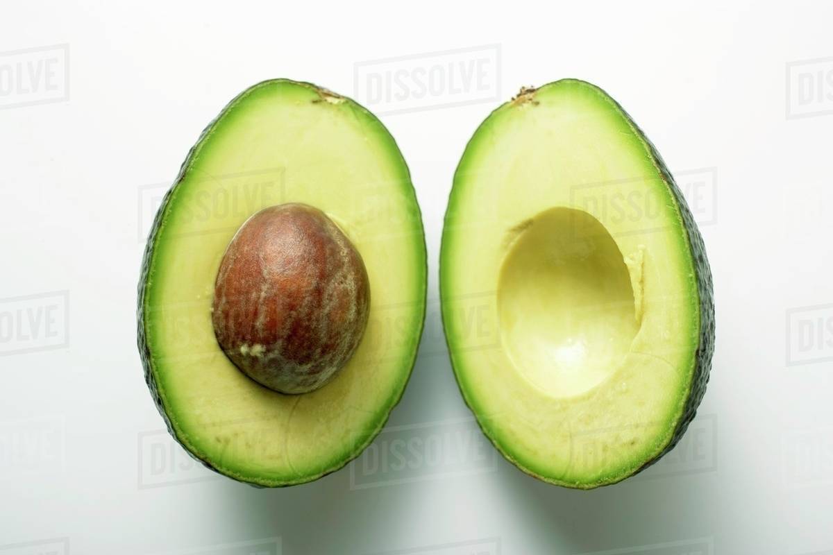 Avocado, halved - Royalty-free Stock Photo | Dissolve