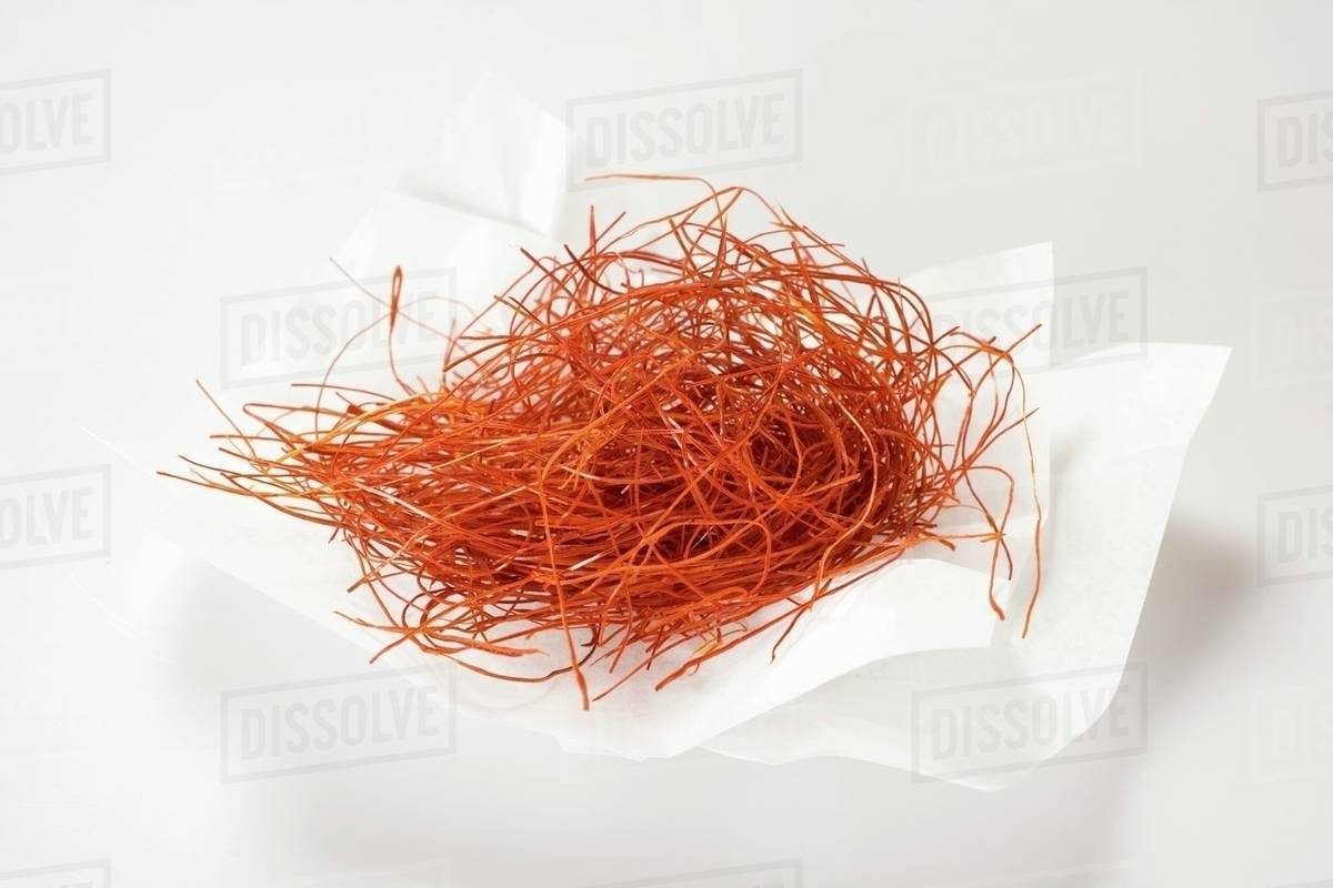 Saffron threads on paper - Royalty-free Stock Photo | Dissolve