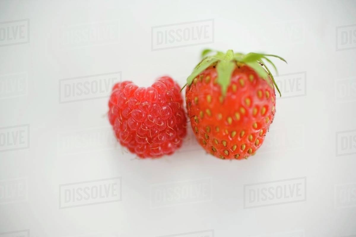 Raspberry and strawberry - Royalty-free Stock Photo | Dissolve