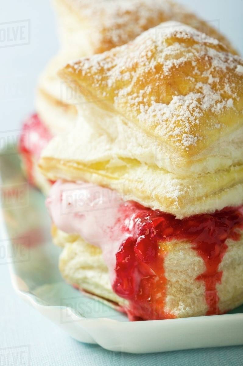 Puff pastries filled with raspberry ice cream & raspberry sauce ...