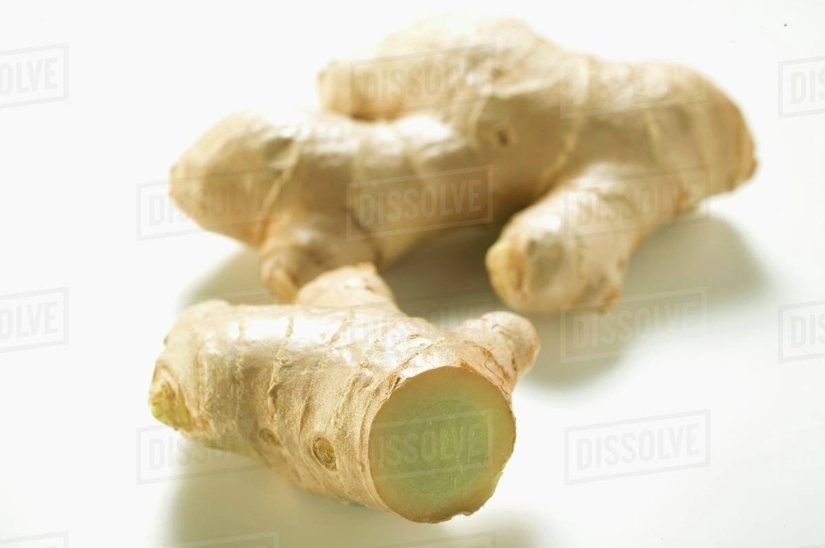 Ginger root, with a piece cut off - Royalty-free Stock Photo | Dissolve