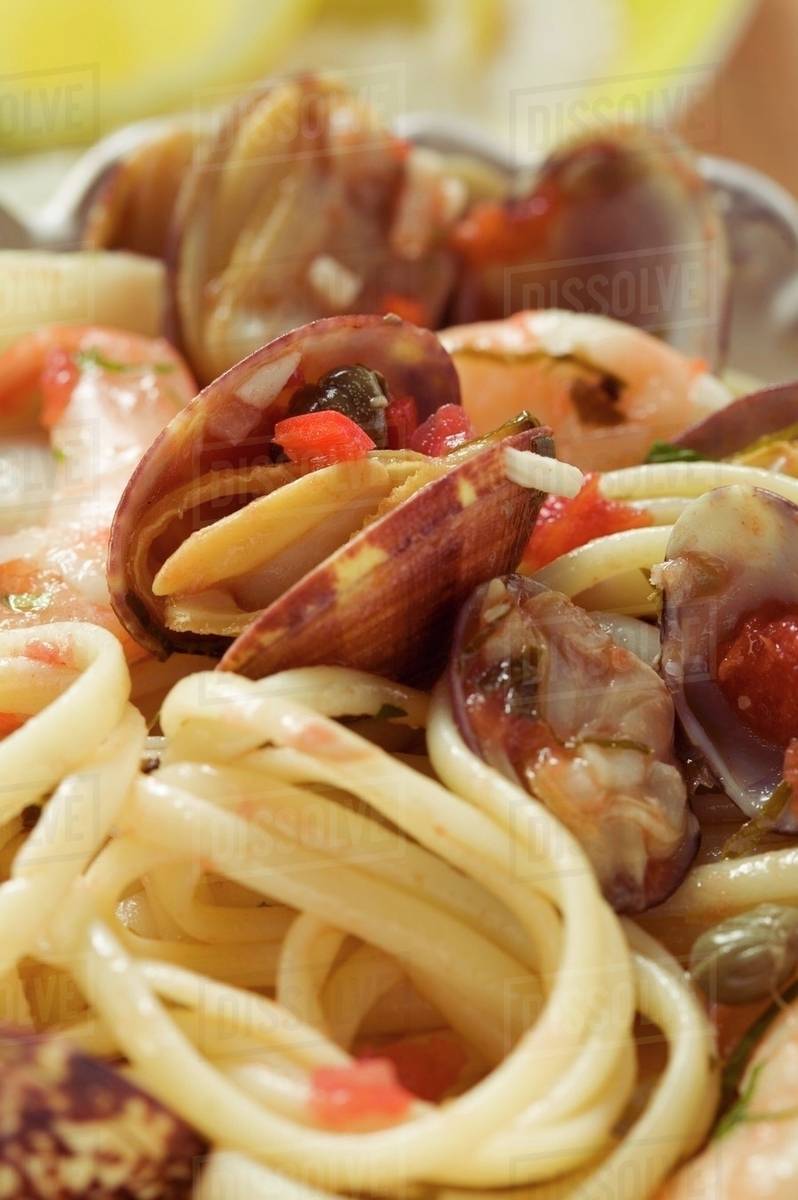 Linguine with seafood, close-up - Stock Photo - Dissolve