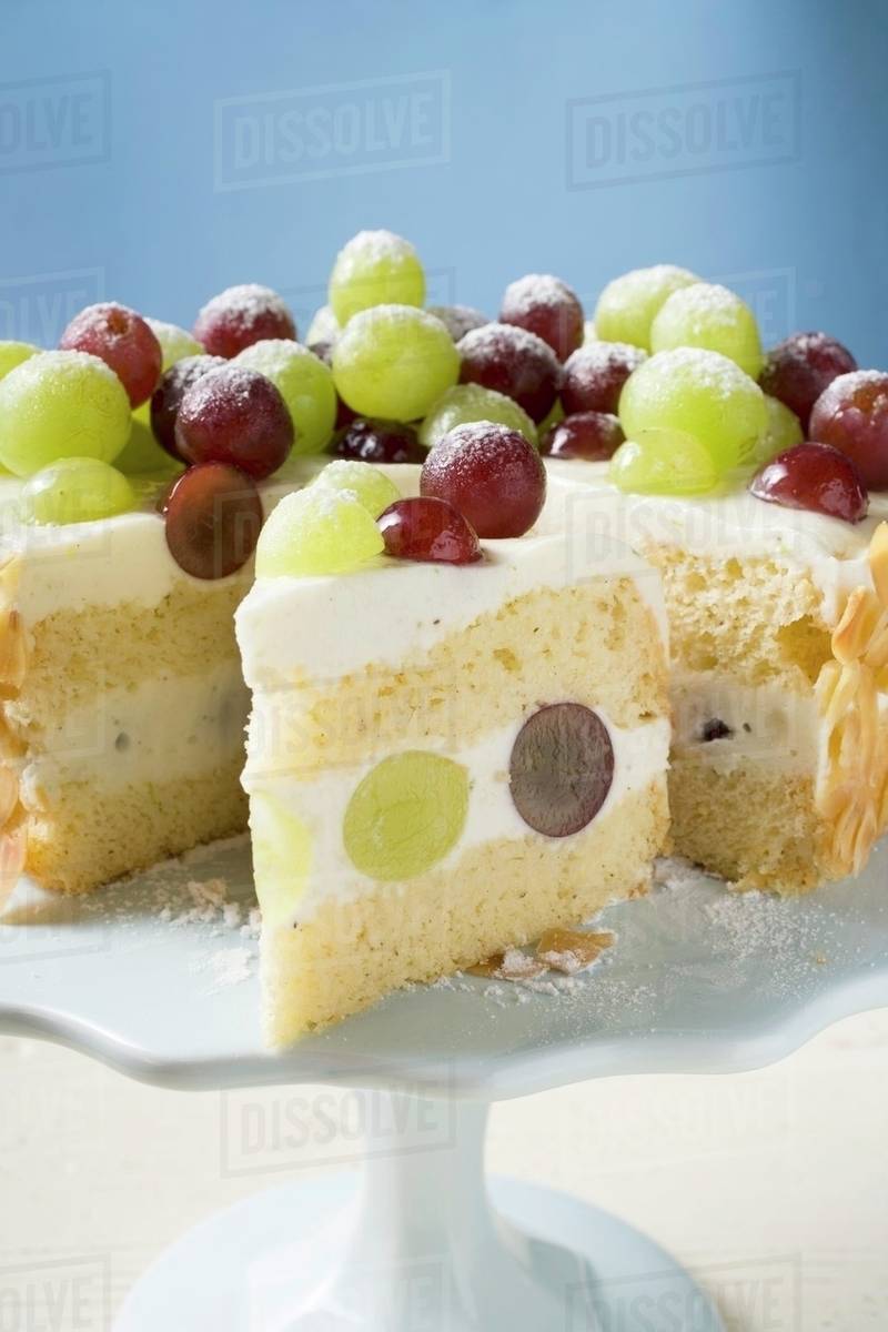 Grape cake, a slice cut, on cake stand - Royalty-free Stock Photo ...