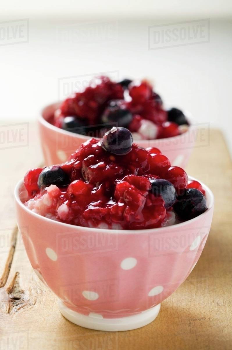 Rice pudding with berries - Stock Photo - Dissolve