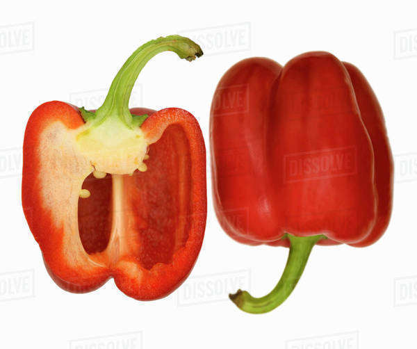 A red pepper and half a pepper - Royalty-free Stock Photo | Dissolve