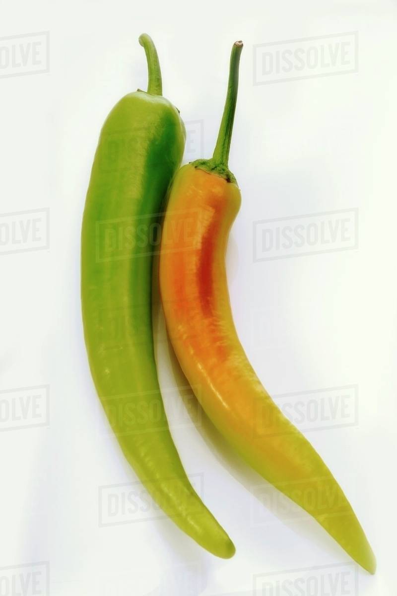 Two chili peppers - Royalty-free Stock Photo | Dissolve