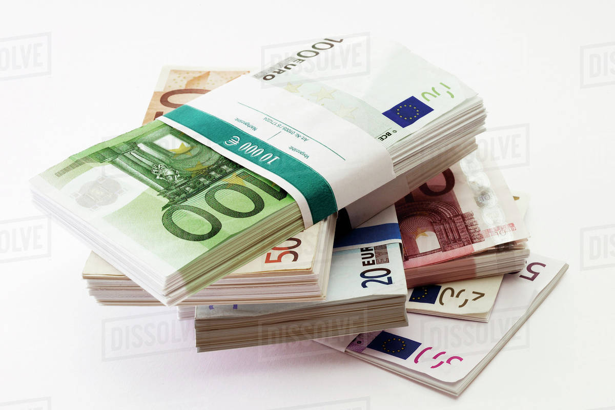 Bundles of euro banknotes, close-up - Stock Photo - Dissolve
