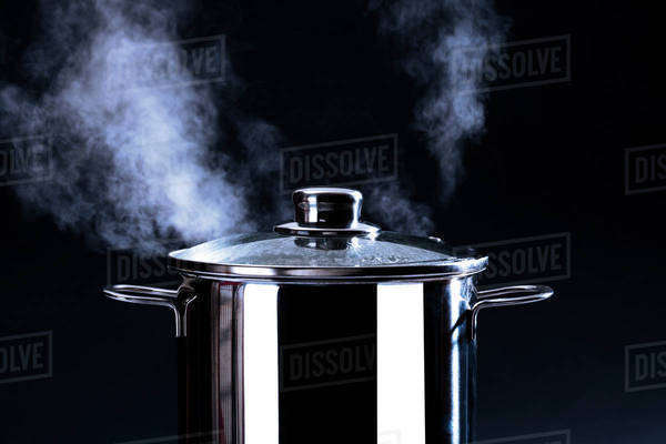 Steaming cooking pot, close-up - Stock Photo - Dissolve