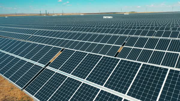 Rows of solar panels installed in the field. Solar cells, renewable ...