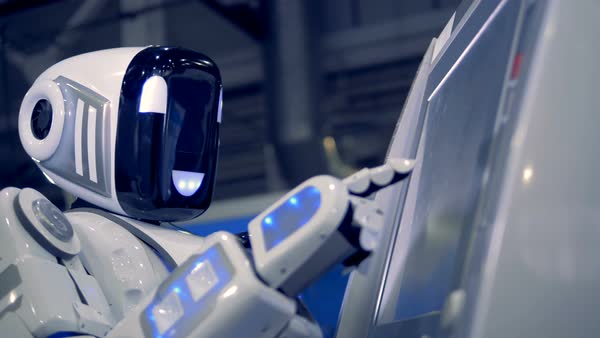 Cheerful robot is poking touchscreen during working process - 4K ...