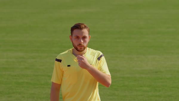 Football Soccer referee showing VAR Video Assistant Referee with hands ...