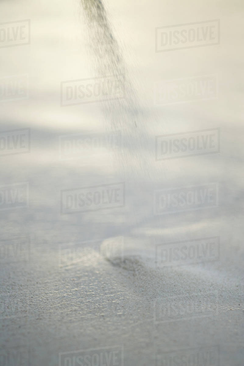 Sand falling onto beach - Stock Photo - Dissolve