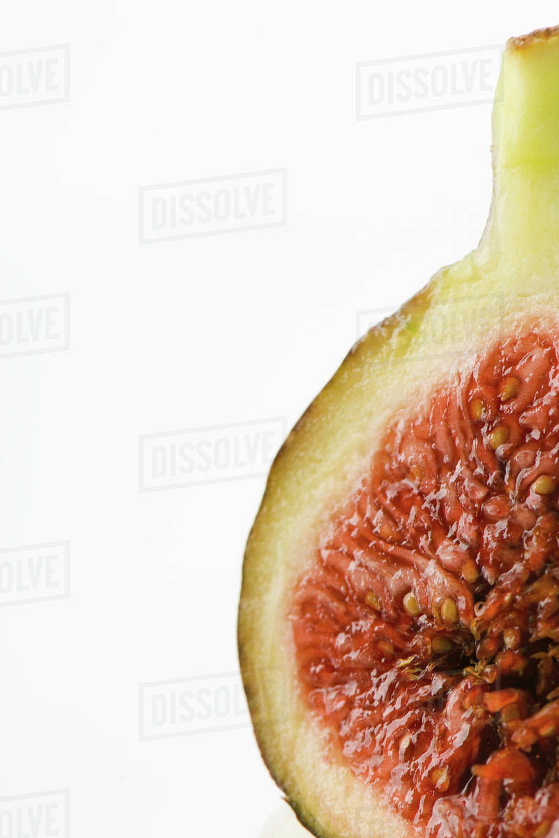 Fresh fig, cross section, cropped - Royalty-free Stock Photo | Dissolve
