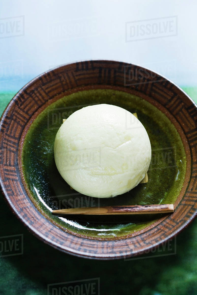 Manju (Japanese cake filled with bean paste) on plate, overhead view ...