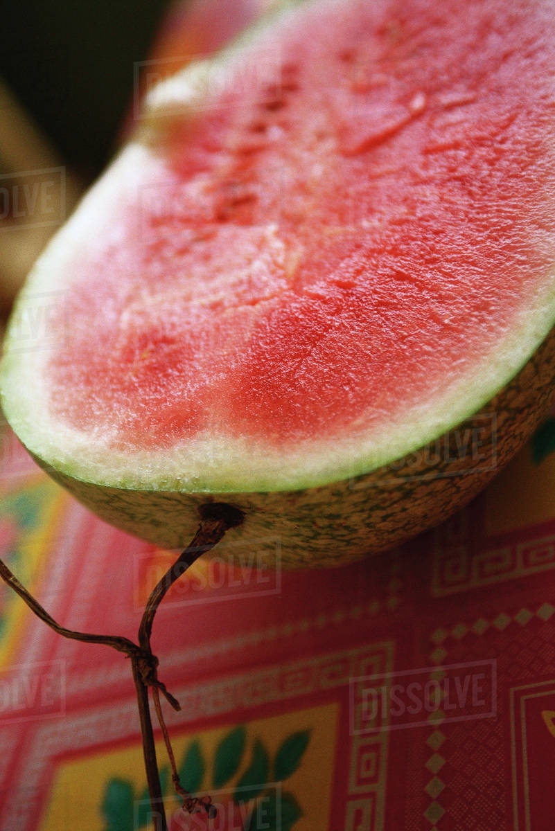 Watermelon sliced in half - Royalty-free Stock Photo | Dissolve