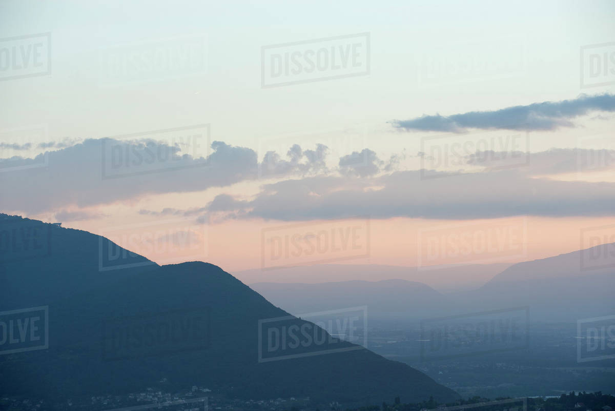 Sun rising over valley - Royalty-free Stock Photo | Dissolve