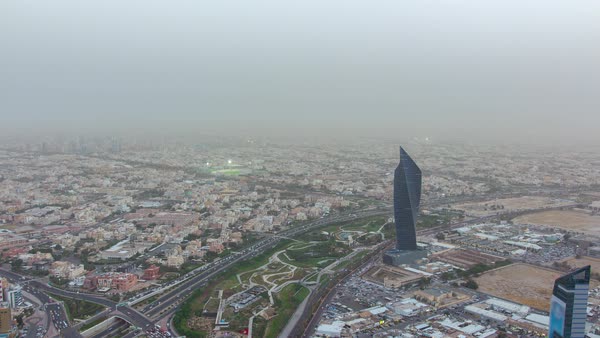 Kuwait City cityscape from top day to night transition timelapse with ...