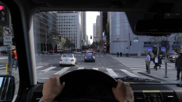 Driver POV stopping at a red light in busy intersection. - Stock Video ...